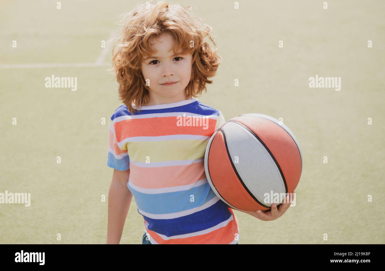 Basketball kids training game. Portrait of sporty child. Young boy ...