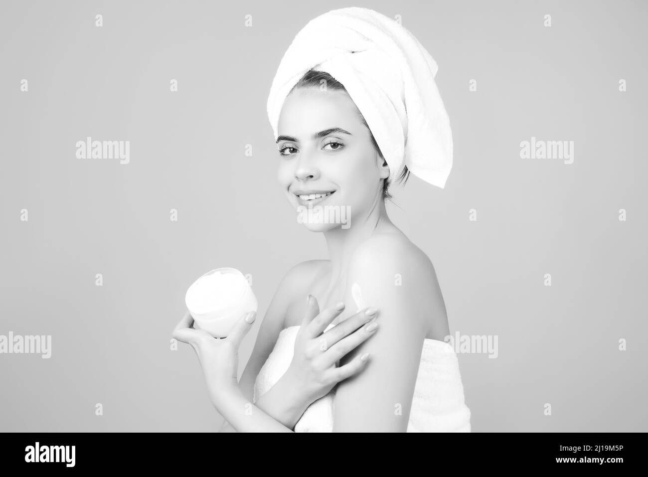 Cosmetic Cream On Woman Smiling Face With Clean Soft Skin Body Care