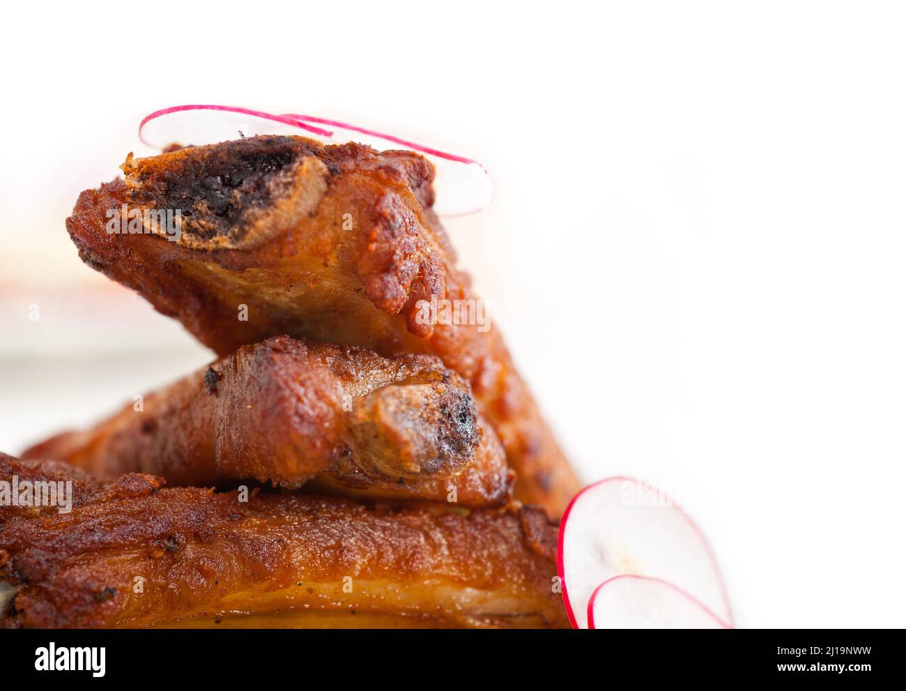 Traditional Italian roasted pork ribbs Stock Photo - Alamy