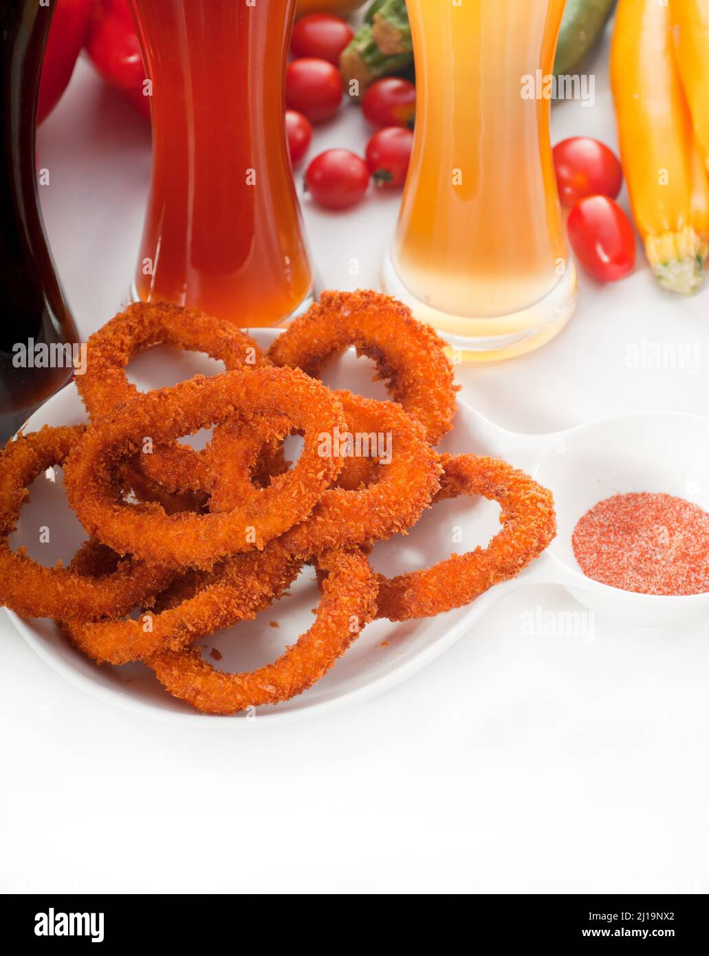 Deep fried calamari rings served with selection of black, red and ...