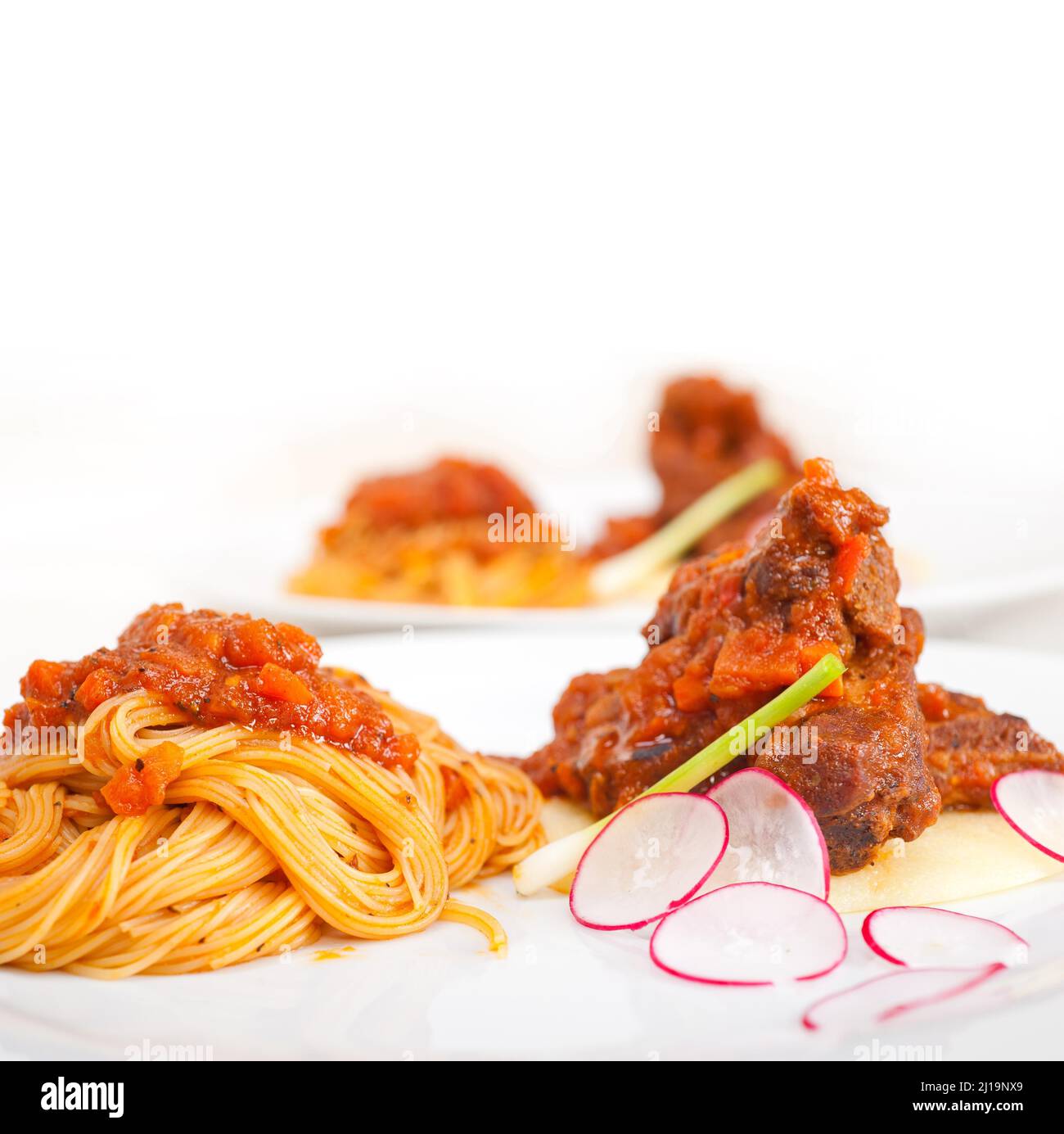 Traditional Italian spaghetti pasta with pork ribbs sauce Stock Photo ...