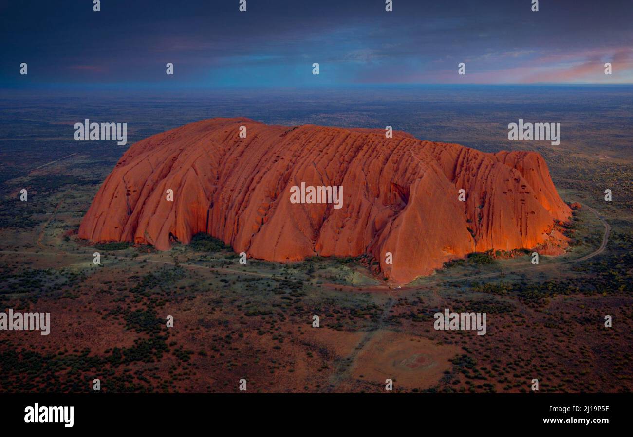Ayers Rock, Uluru, in evening sun, aerial view, Northern Territory ...