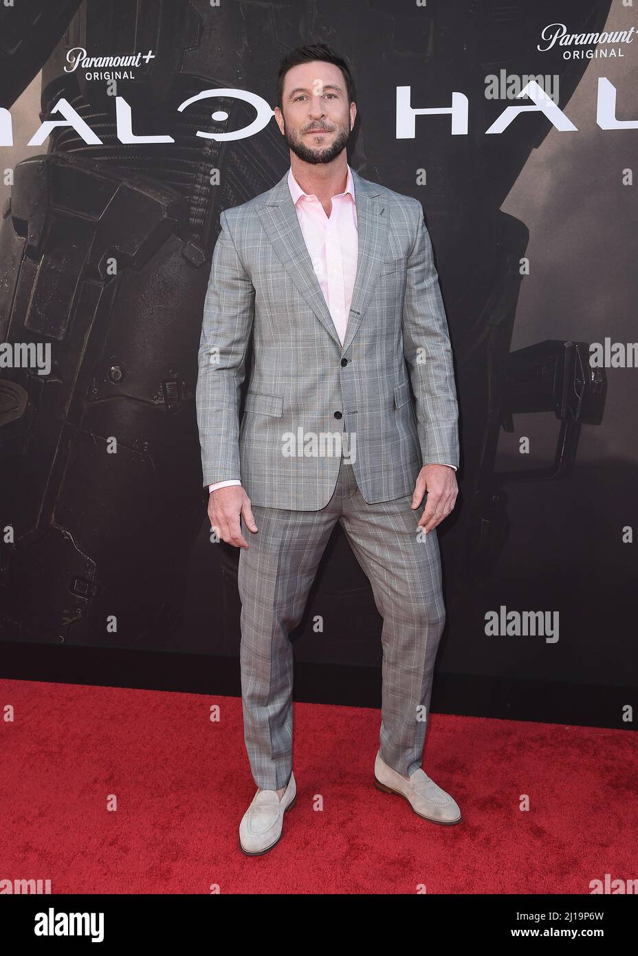 Los Angeles, USA. 23rd Mar, 2022. Pablo Schreiber walking on the red ...