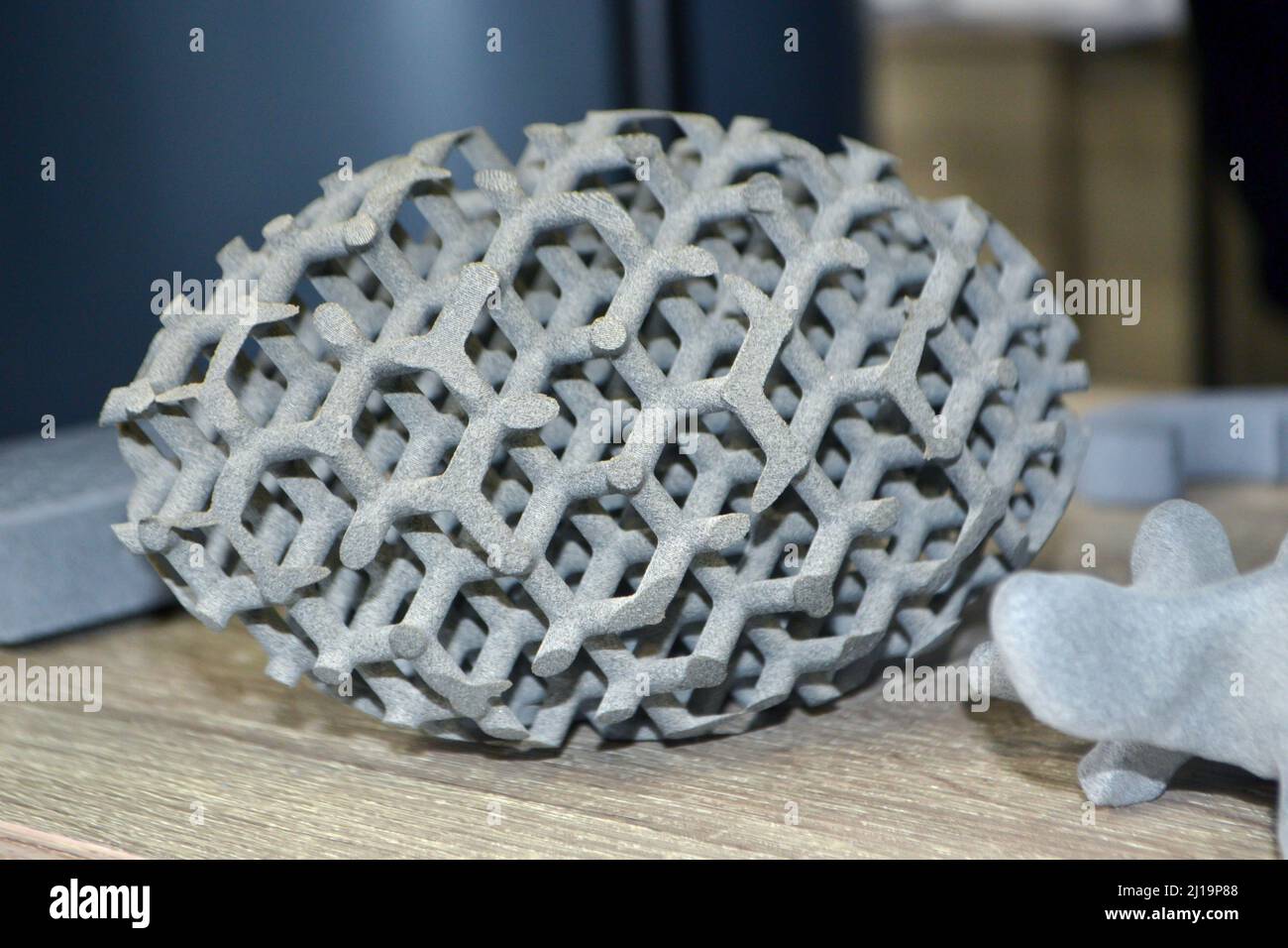 Gray abstract model object printed on 3d printer from powder close-up ...