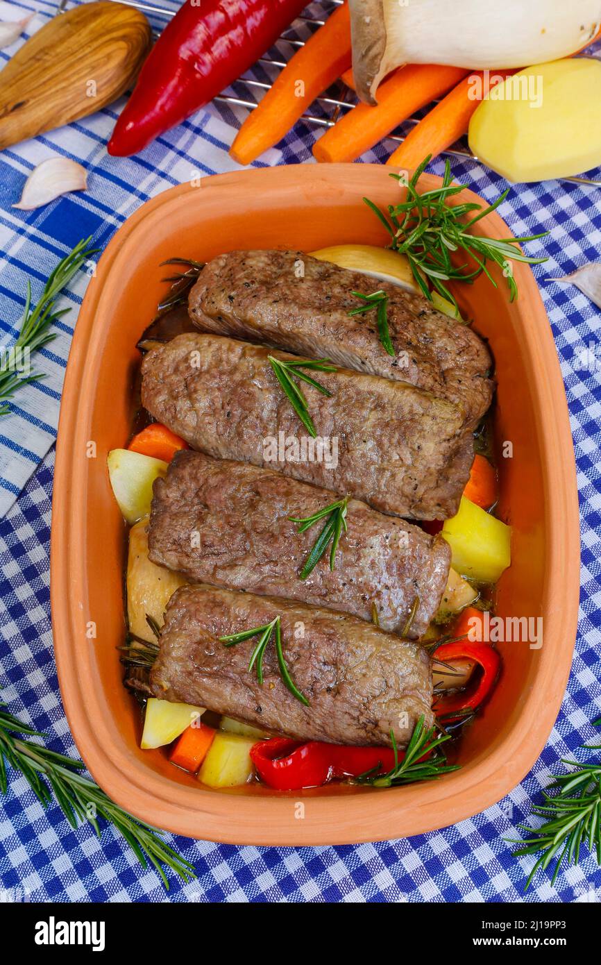 Southern German cuisine, lamb on vegetables from the Roman pot ...