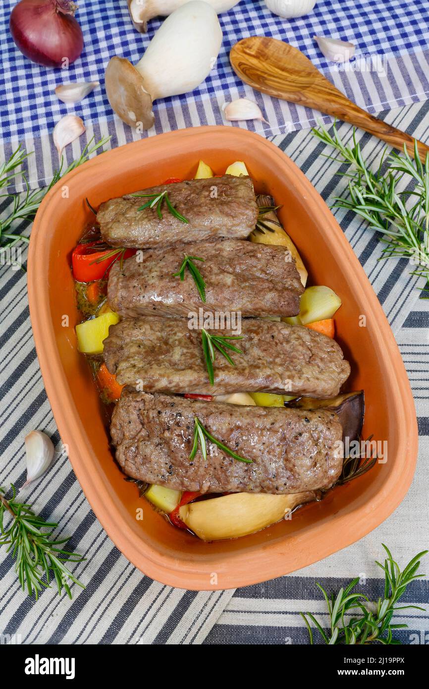 Southern German cuisine, lamb on vegetables from the Roman pot ...