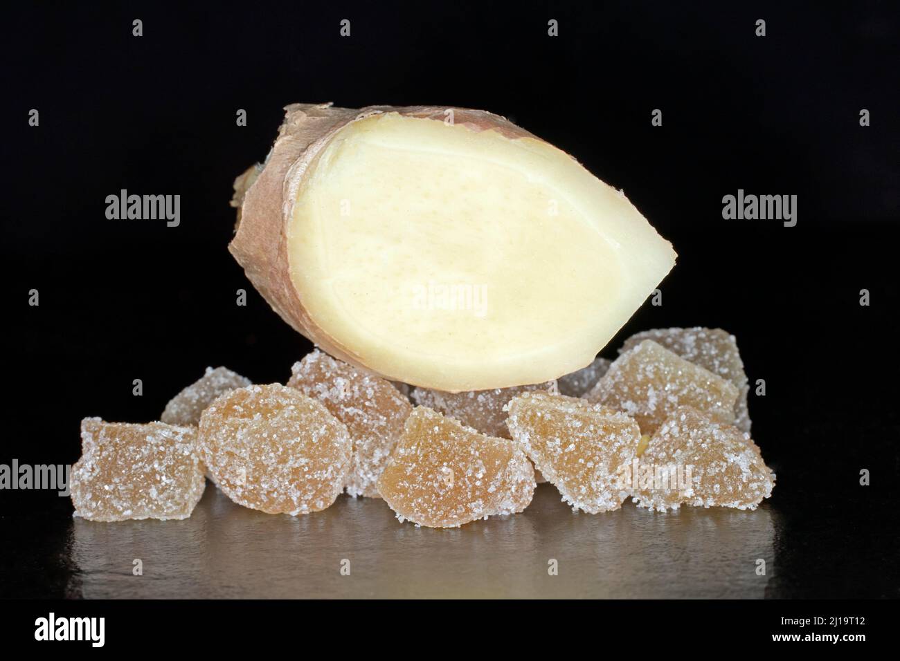 Diced and candied ginger as well as fresh ginger, studio photography ...