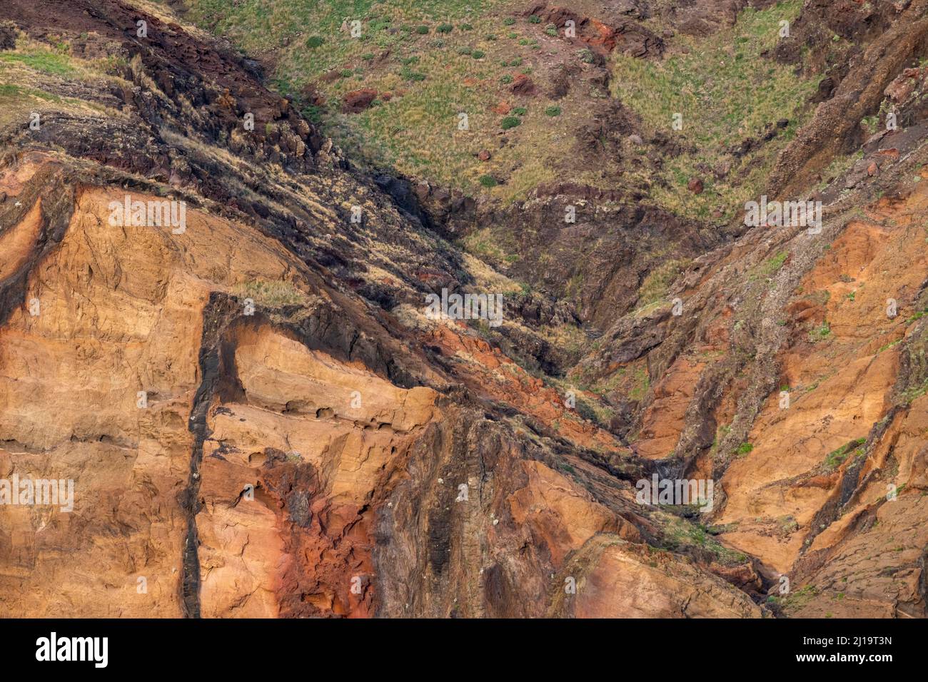 Sao Lourenco volcanic peninsula, close-up, colourful rocks, rocky coast ...