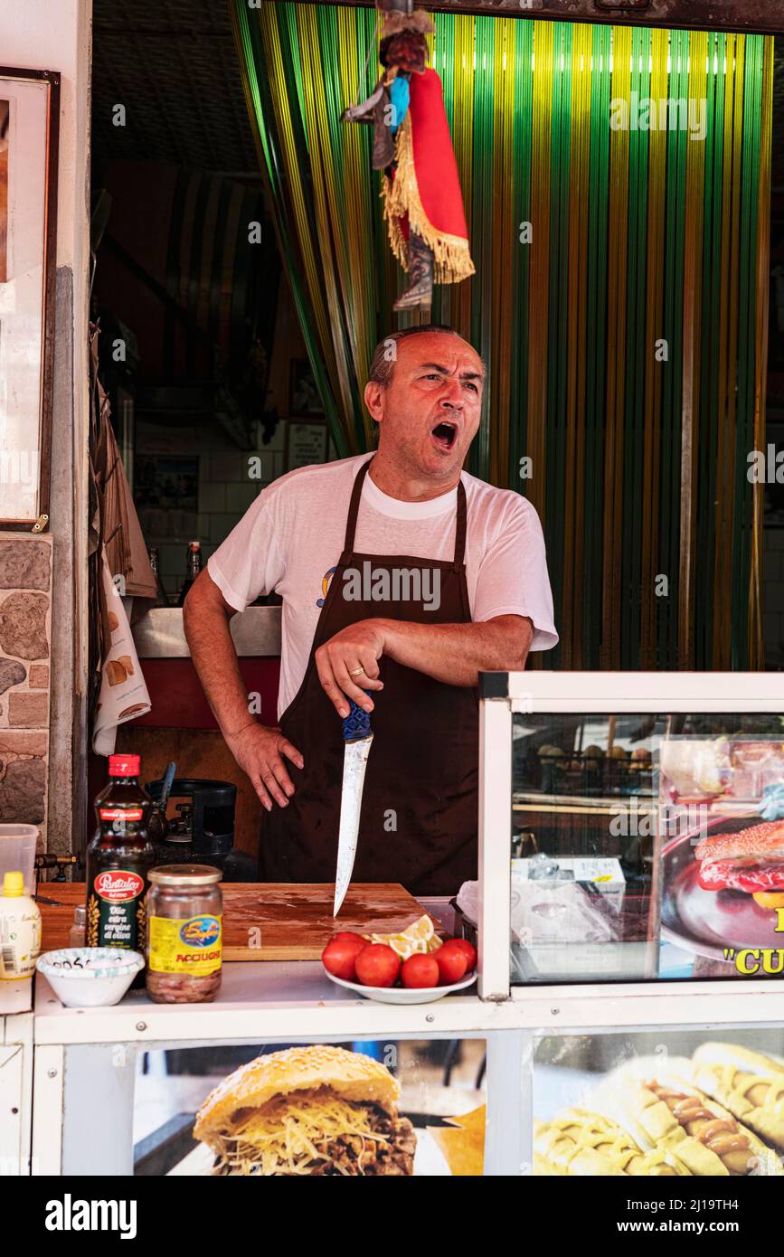 Vendors of frittola at Ballaro market, traditional snack of deep-fried ...