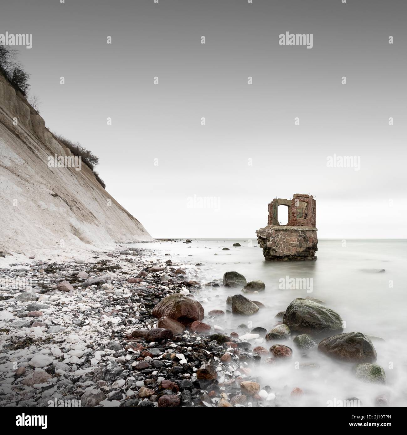 Old tide gauge house on the beach near Kap Arkona on the German island ...