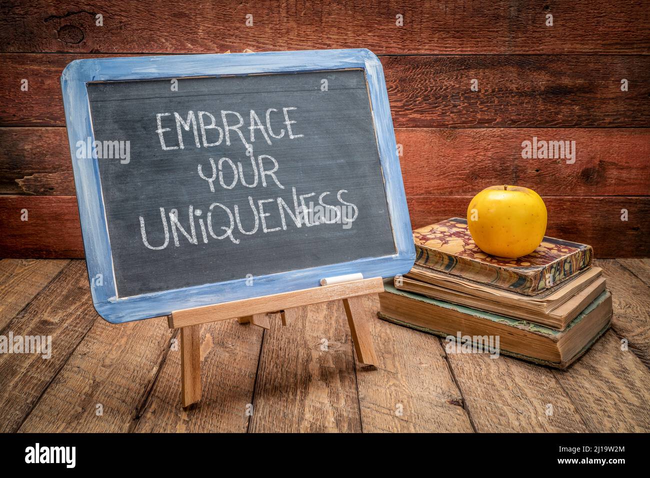 embrace your uniqueness - white chalk writing on a retro slate ...