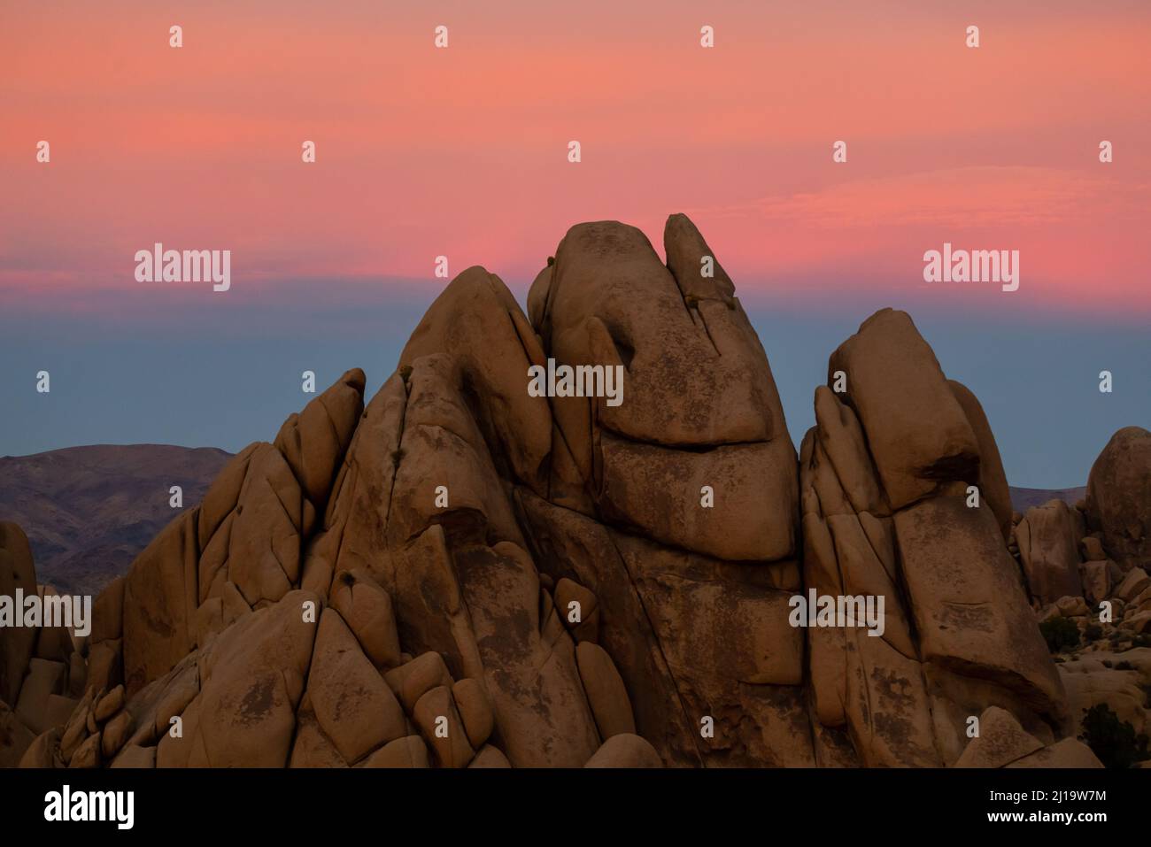 Incredible pink, orange sunset seen over desert landscape in Mojave ...