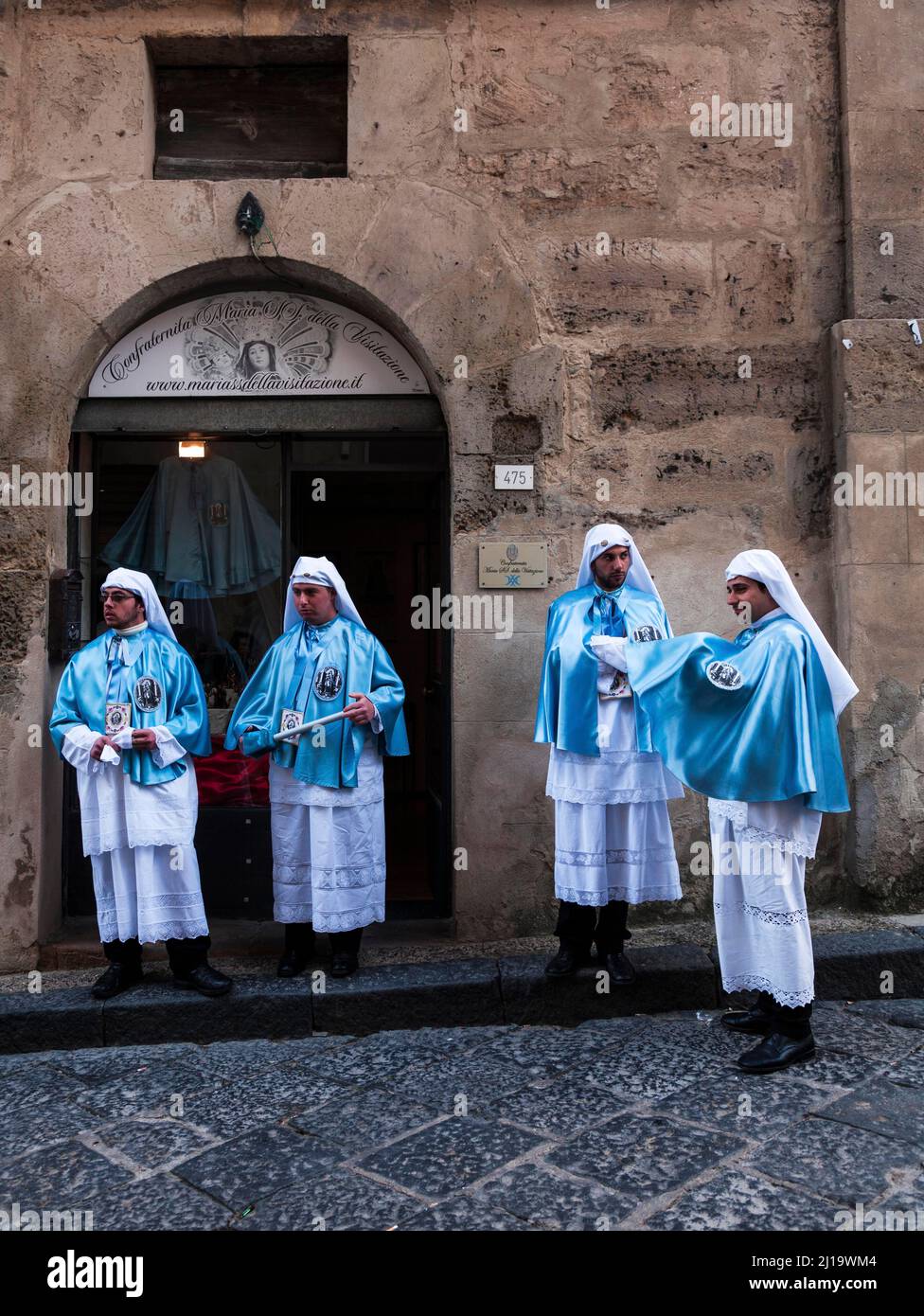 Members of a brotherhood during Good Friday in the streets of Enna ...