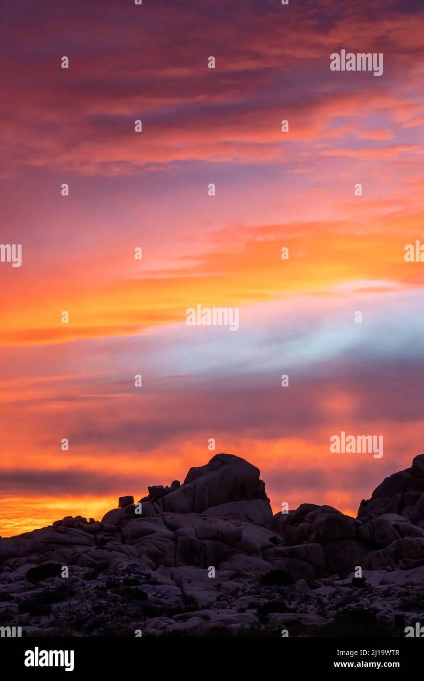 Incredible pink, orange sunset seen over desert landscape in Mojave ...