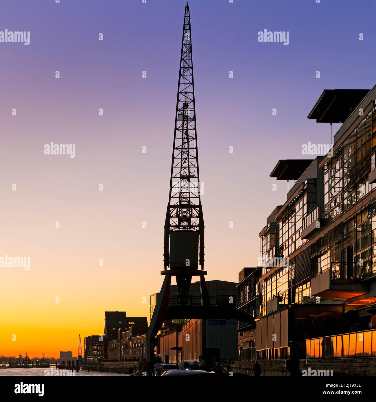 Crane at the fishing harbour at sunset, Altona, Hamburg, Germany Stock ...