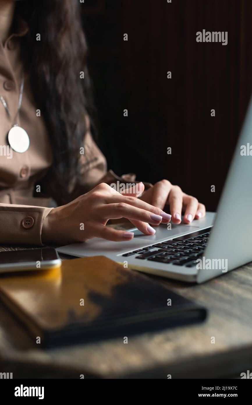 Attractive business woman with a laptop in the office at work. The ...