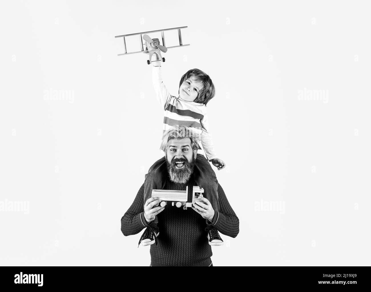 Child son pilot and dad father with airplane Stock Photo - Alamy