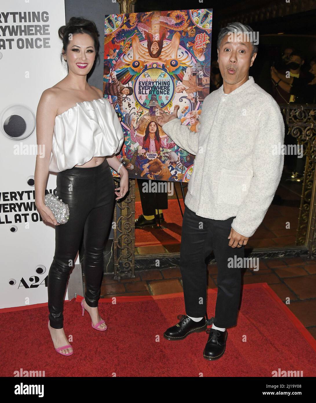 Los Angeles, USA. 23rd Mar, 2022. (L-R) Olivia Cheng and Alain Uy at the EVERYTHING EVERYWHERE ...