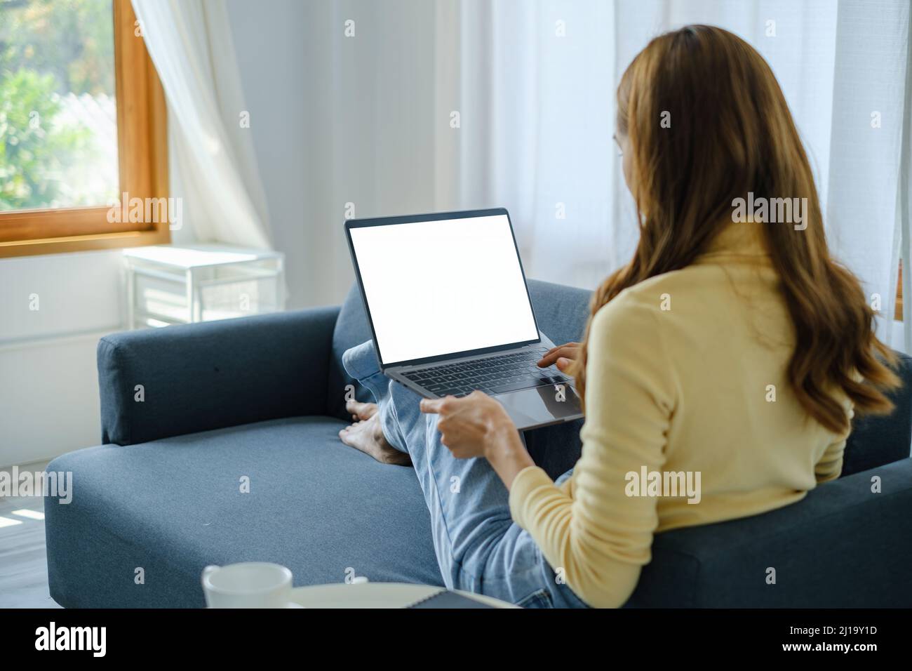 Watch movies on computer hi-res stock photography and images - Alamy
