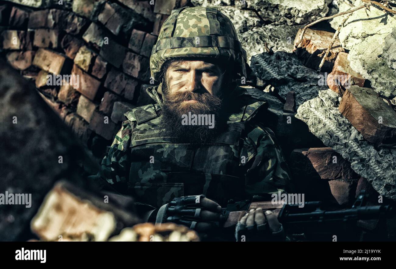 Military company mercenary, brutal soldier in battle in uniform and ...