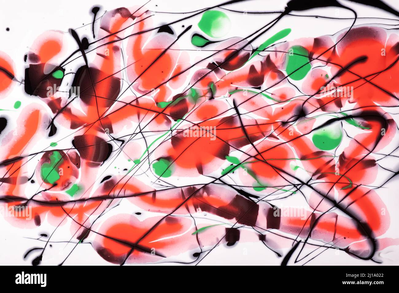 Black and red lines and splashes drawn on white background. Abstract ...