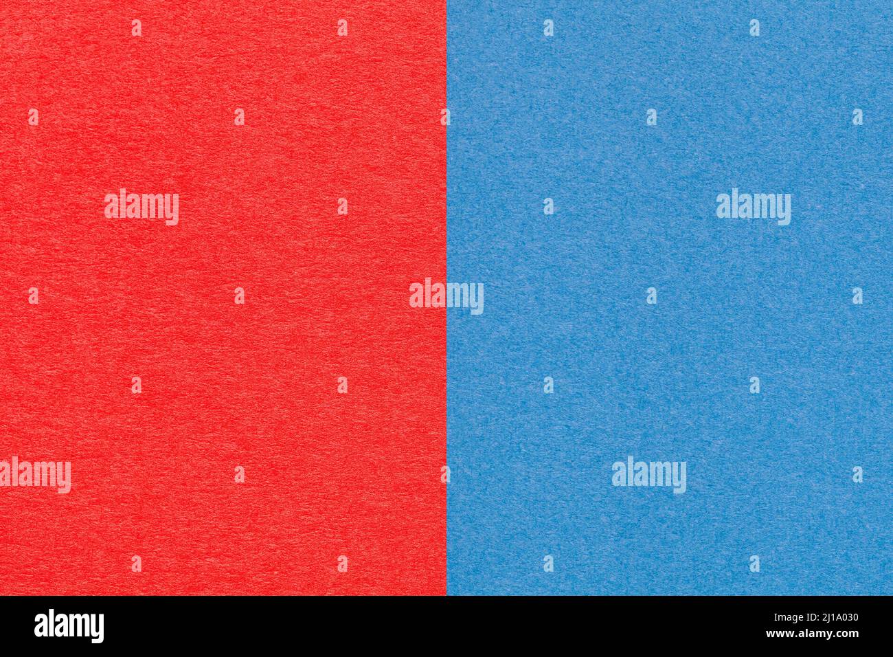Texture of craft red and blue paper background, half two colors, macro ...