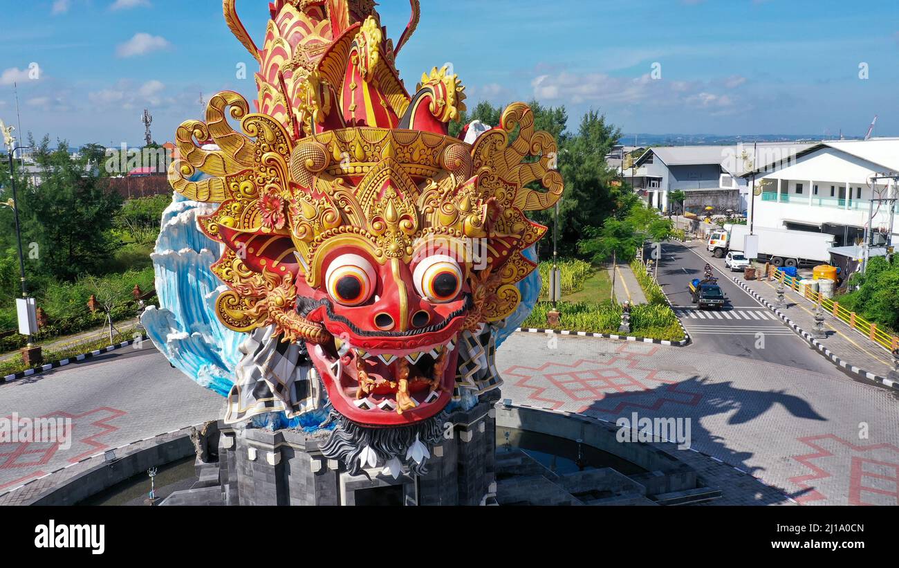 Aerial close up roundabout with fish statue with barong head in ...