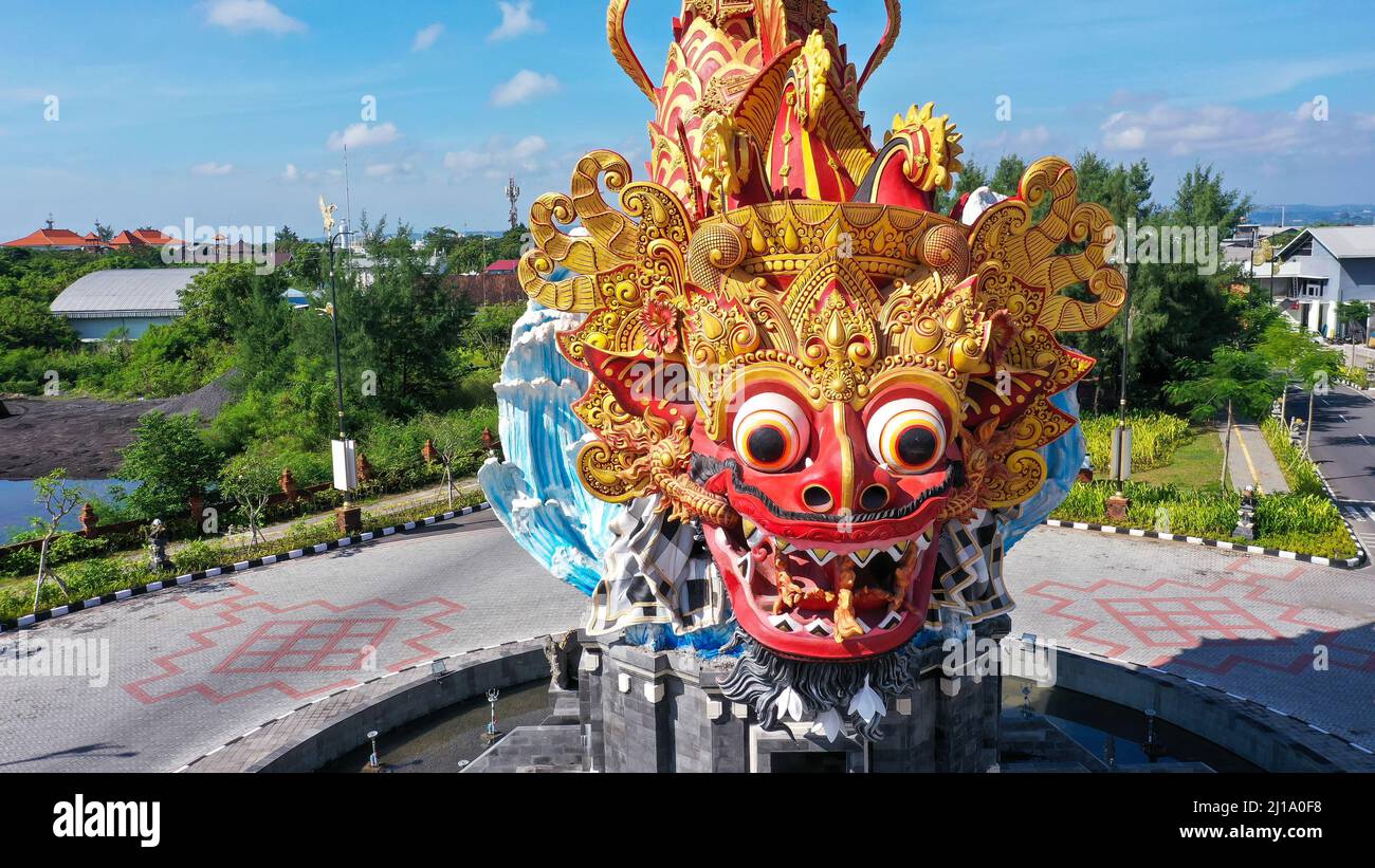 Aerial close up roundabout with fish statue with barong head in ...