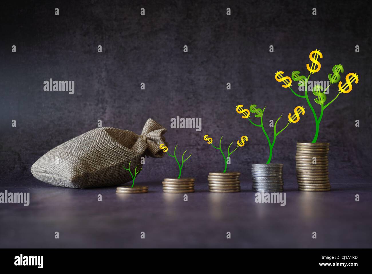 Money growth concept, where small coins in a pile gets bigger and ...