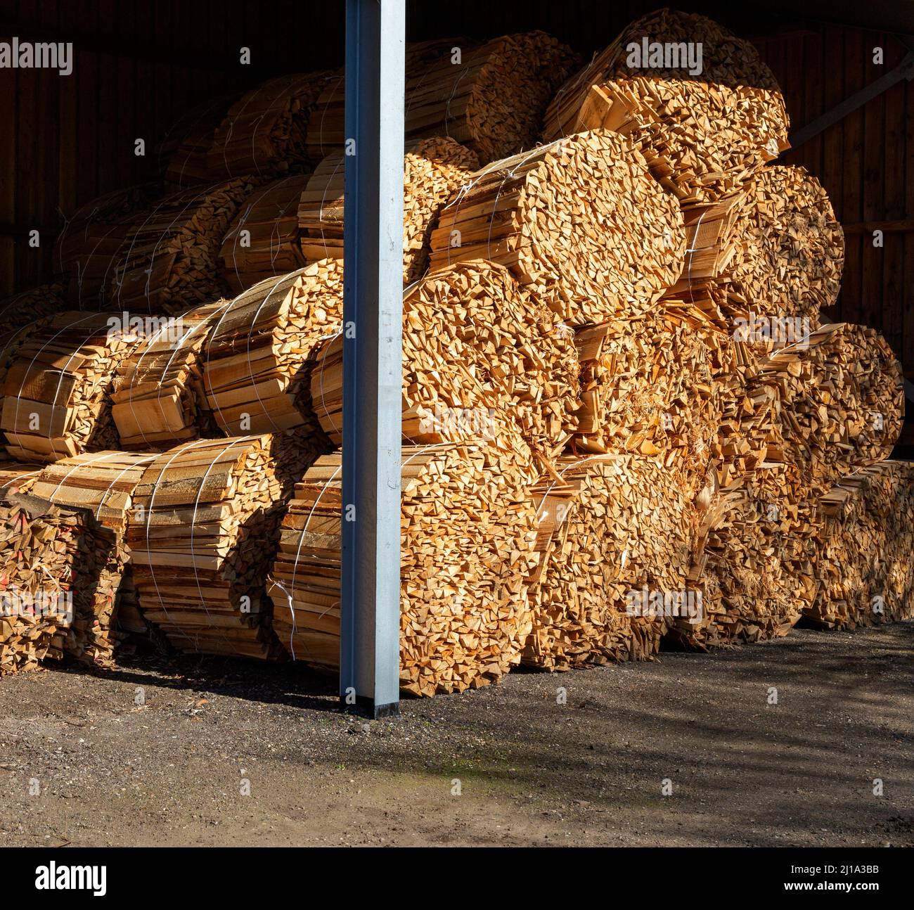 undles of wood offcuts at a willow sawmill, Suffolk, England, UK Stock ...