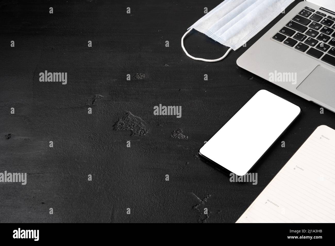 Dark working table with computer keyboard top view Stock Photo - Alamy