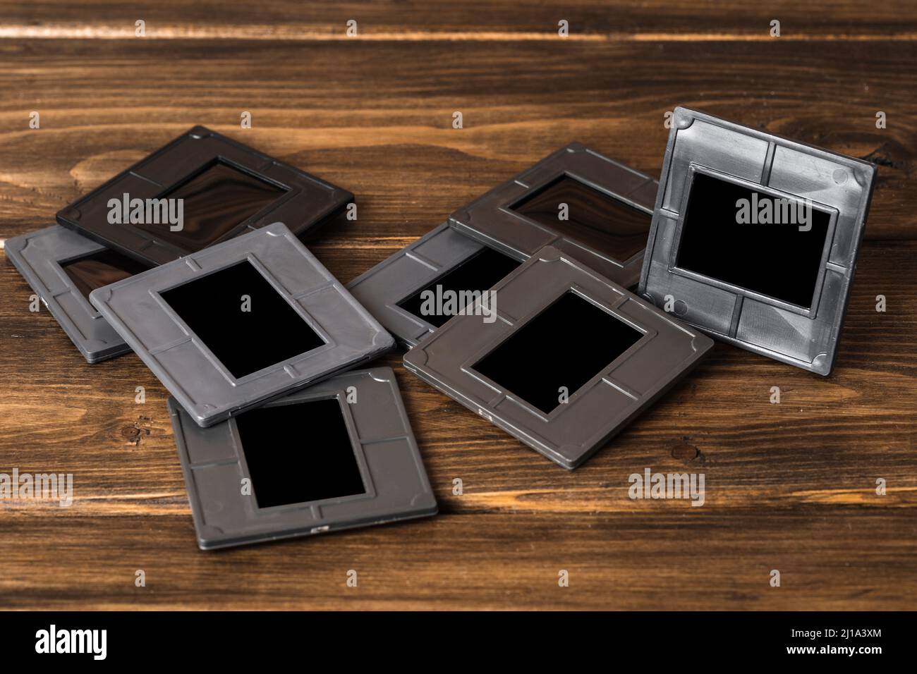 Photography empty slide frames on wooden background Stock Photo - Alamy