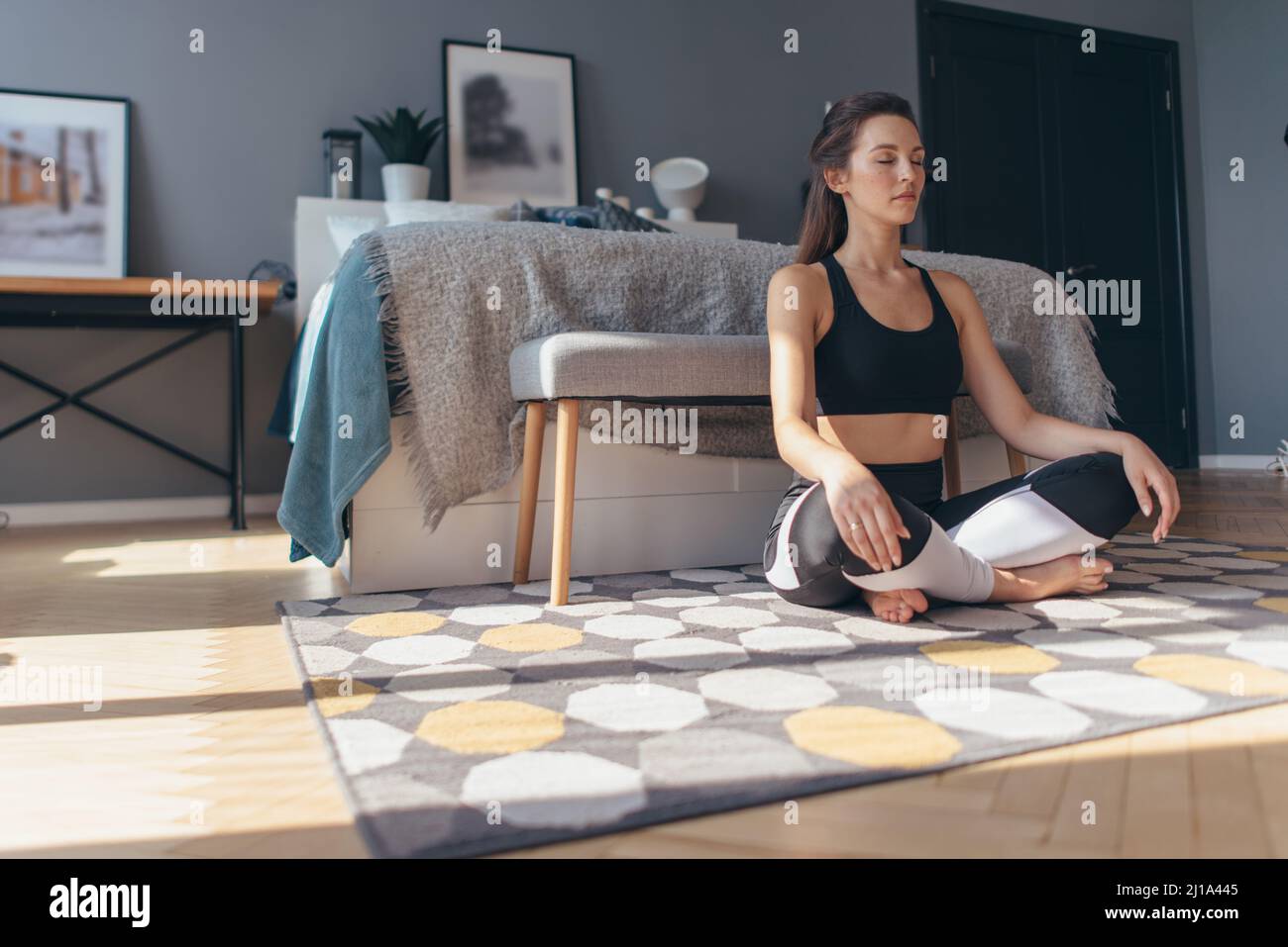 Woman floor legs up bed hi-res stock photography and images - Alamy