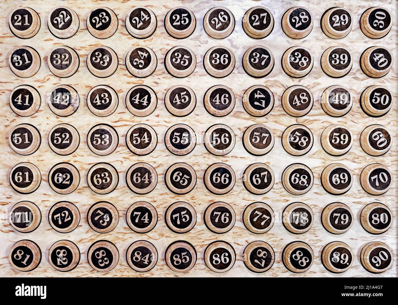 Wooden barrels with numbers for the board game loto Stock Photo - Alamy