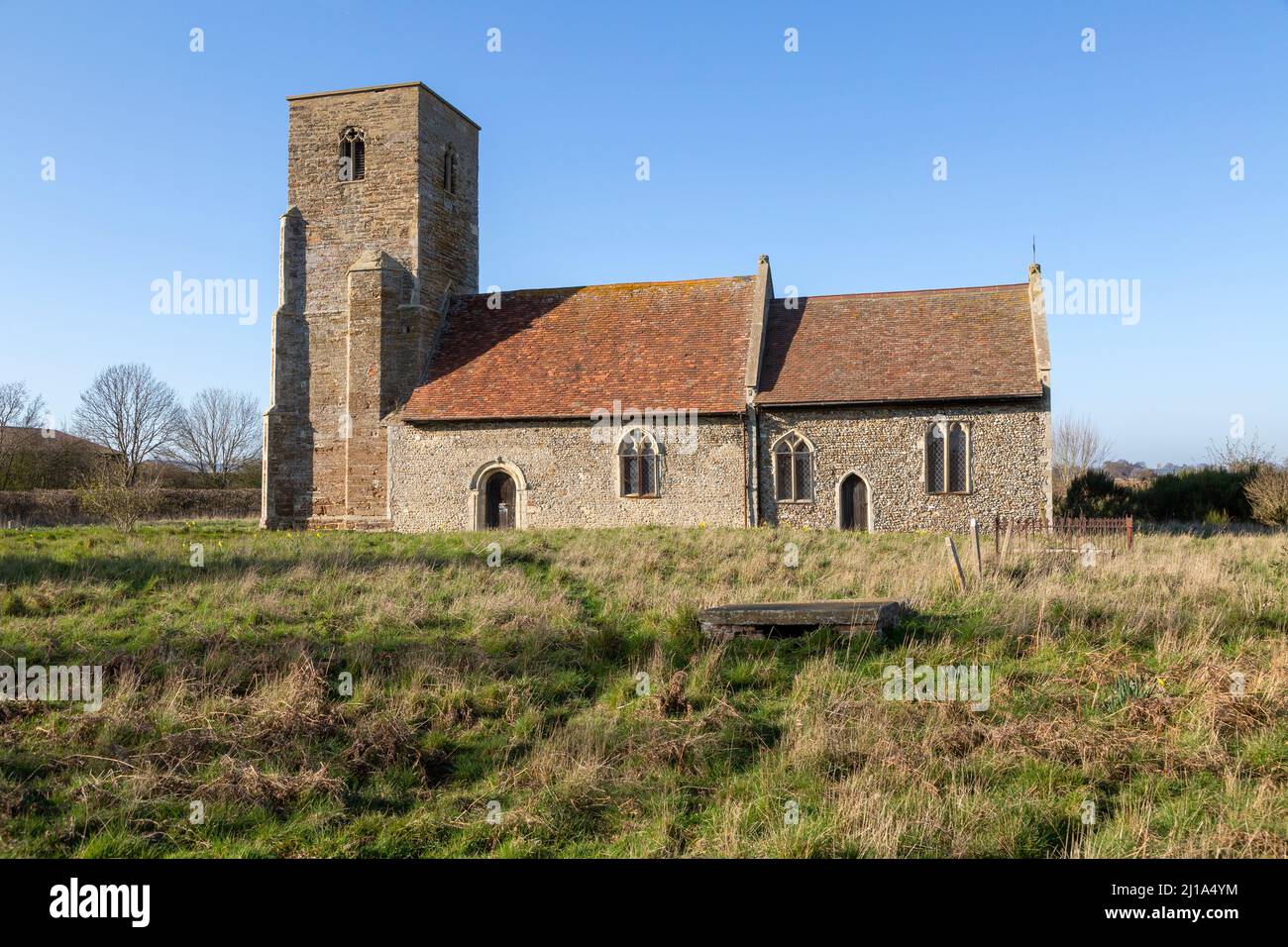 Tower built from coralline crag rock, parish church of Saint John the ...
