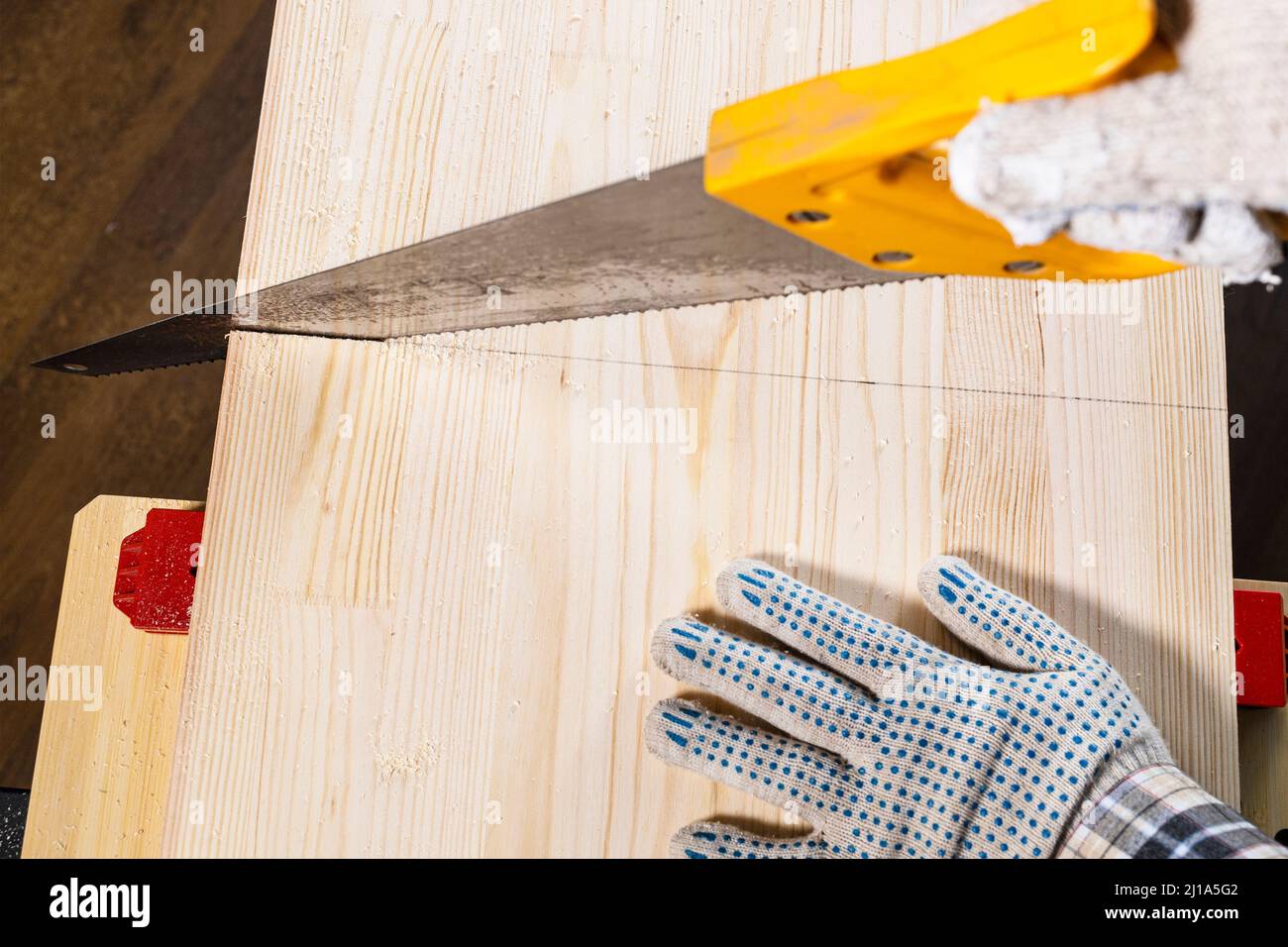 Man using handsaw top view hi-res stock photography and images - Alamy