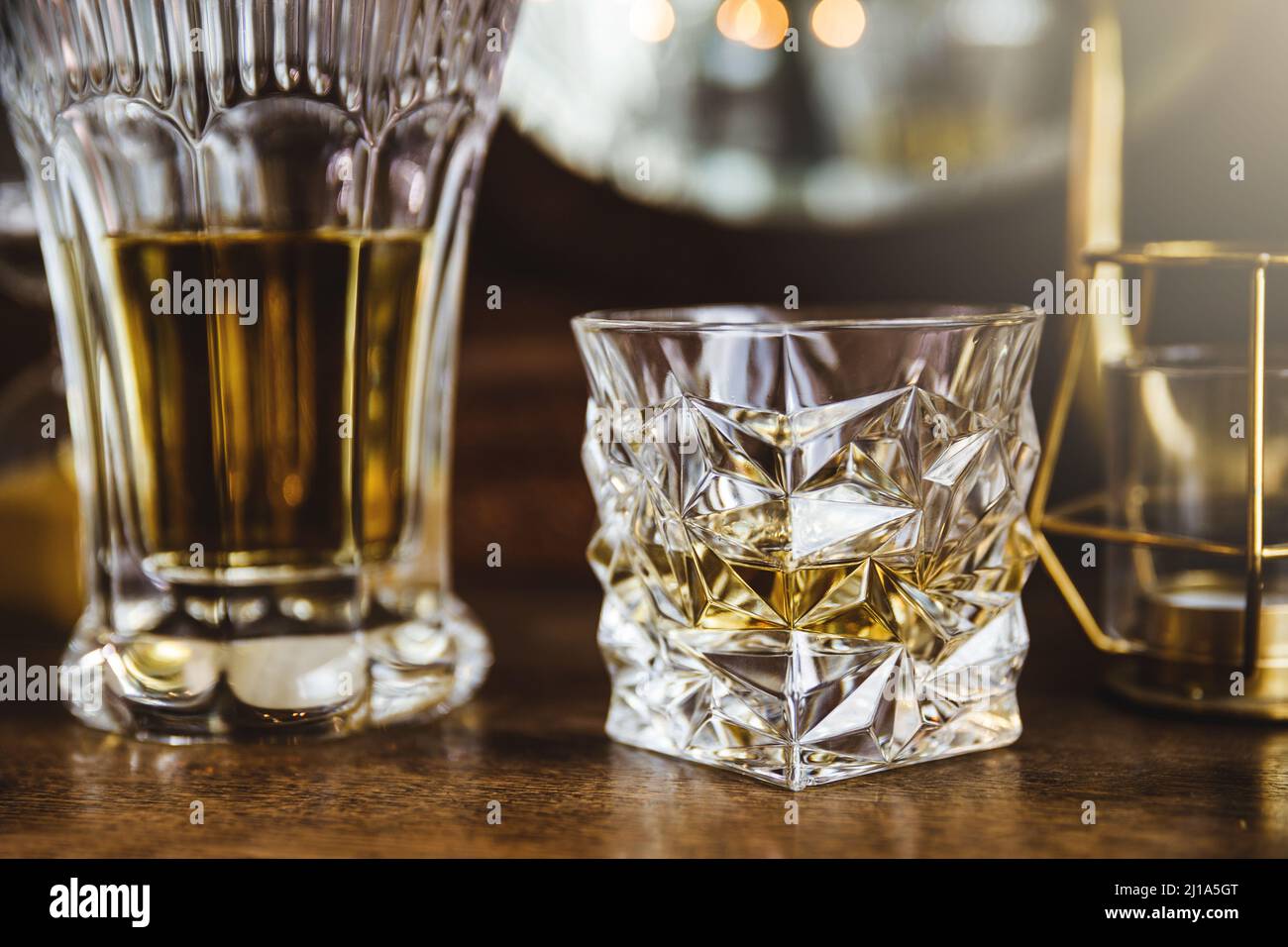 Expensive crystal decanter and glass of whiskey Stock Photo - Alamy