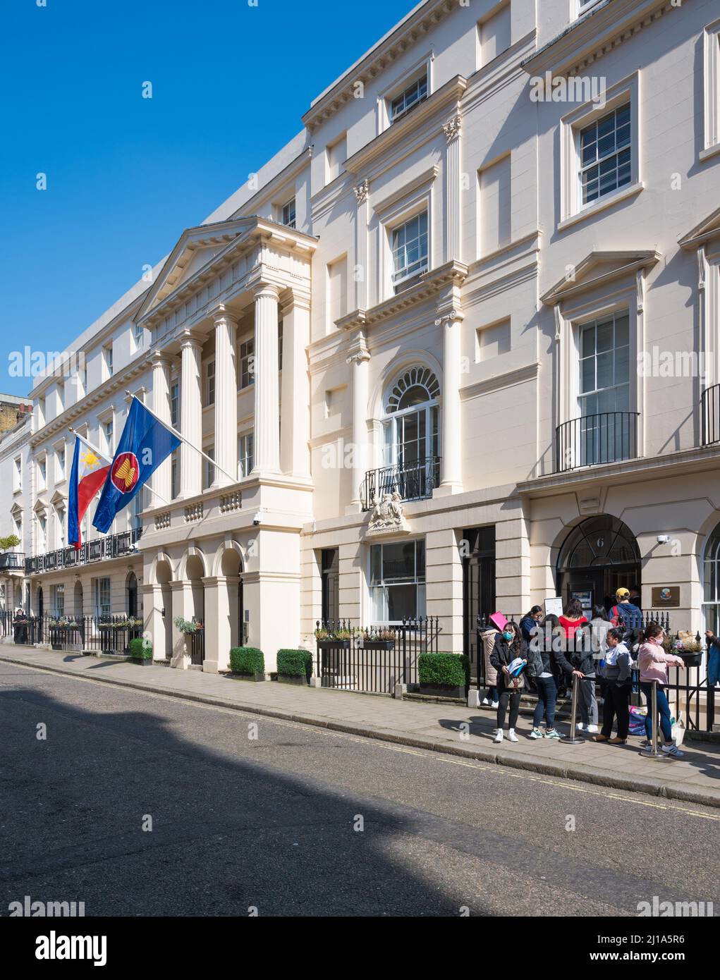 Colourful flags mounted on the main facade of the Philippine Embassy ...