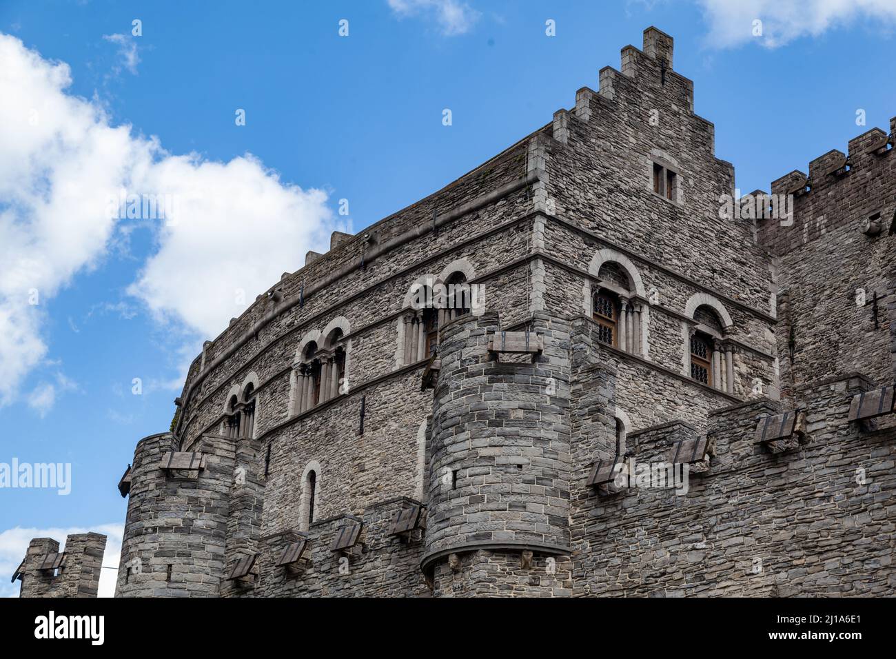 The famous Gravensteen castle on the water canals of Ghent, Belgium ...