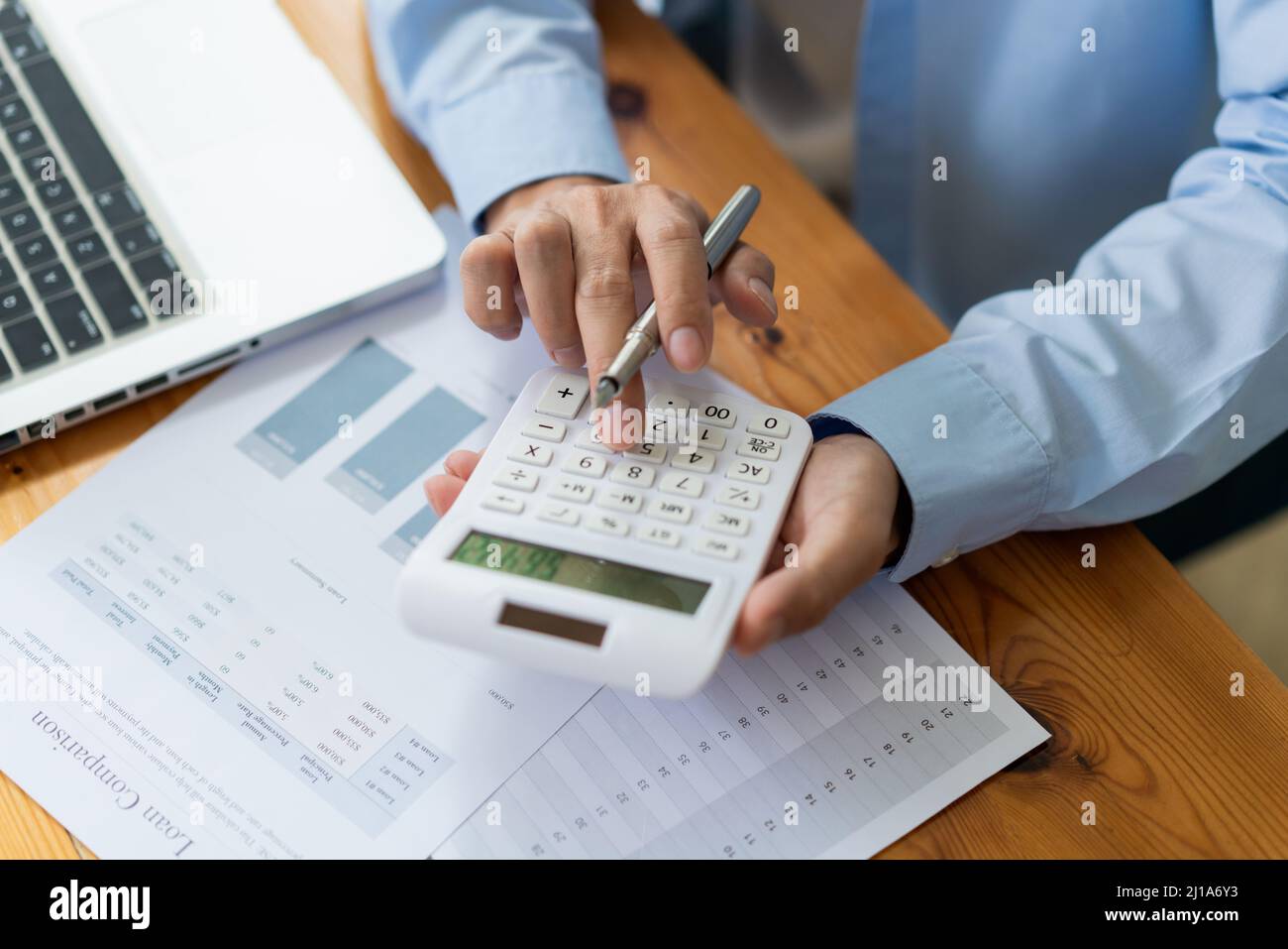 Business analyst concept the accountant looking at the information on ...