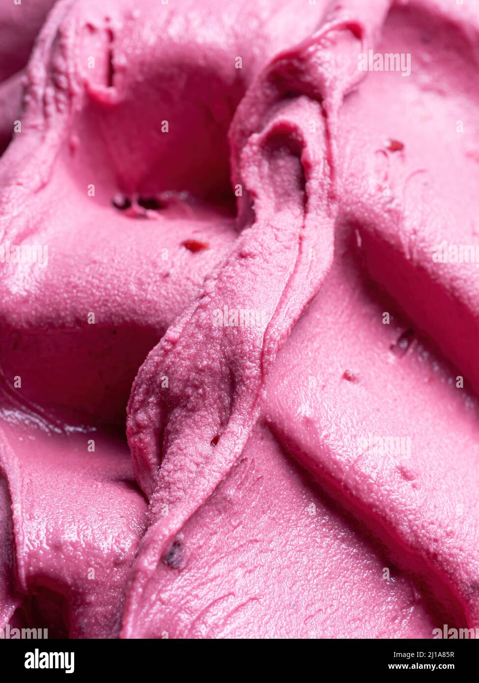 Frozen Pomegranate flavour gelato - full frame detail. Close up of a ...
