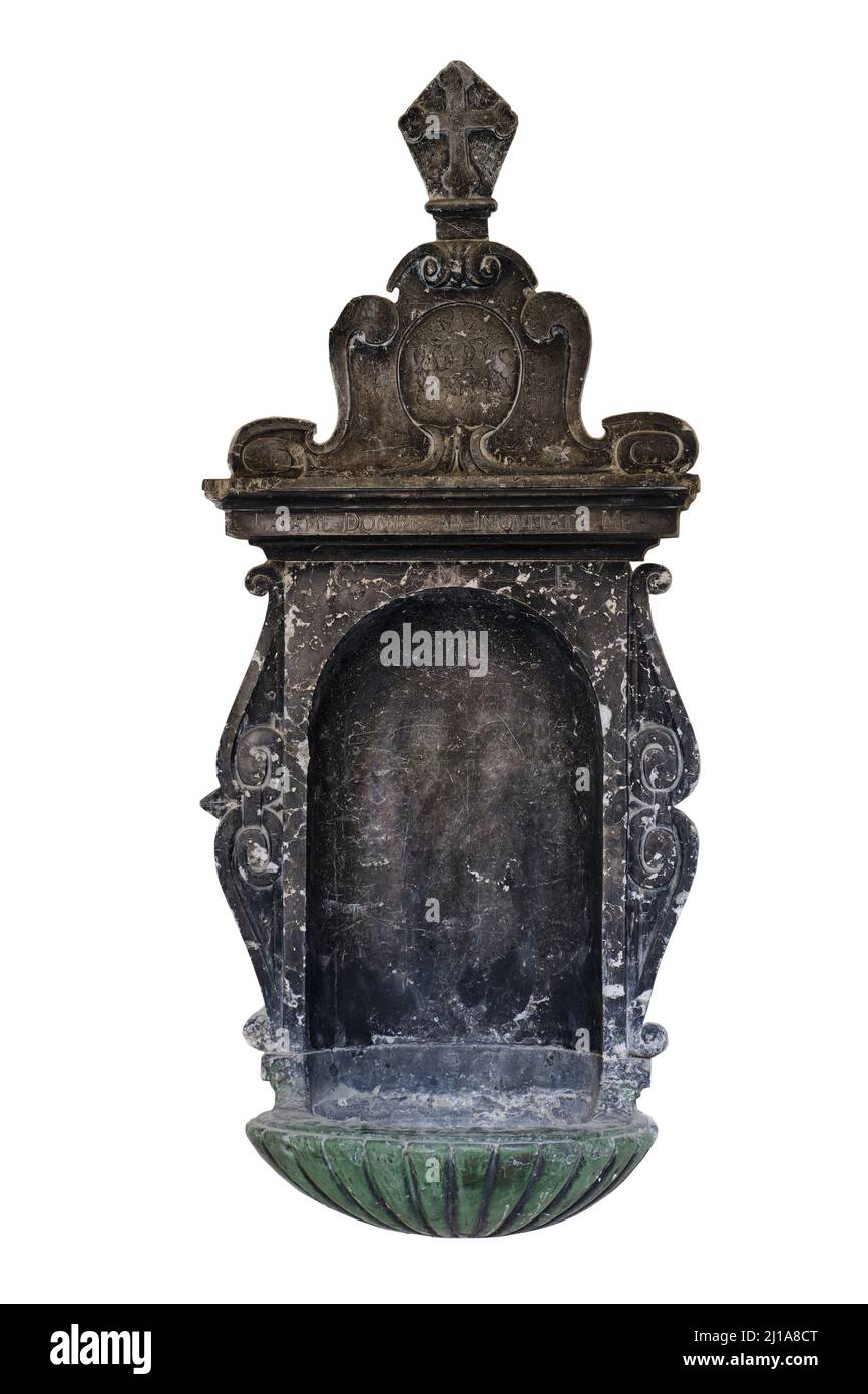 Holy water font at the entrance of the Church. Ancient stone stoup font ...