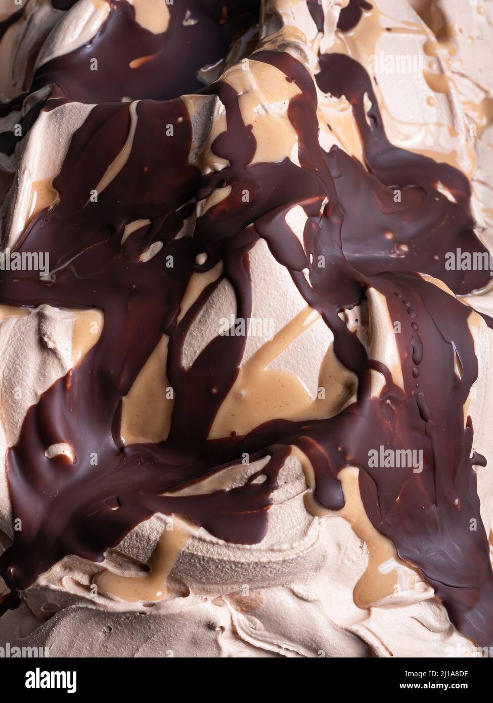 Frozen Toffifee flavour gelato - full frame detail. Close up of beige ...