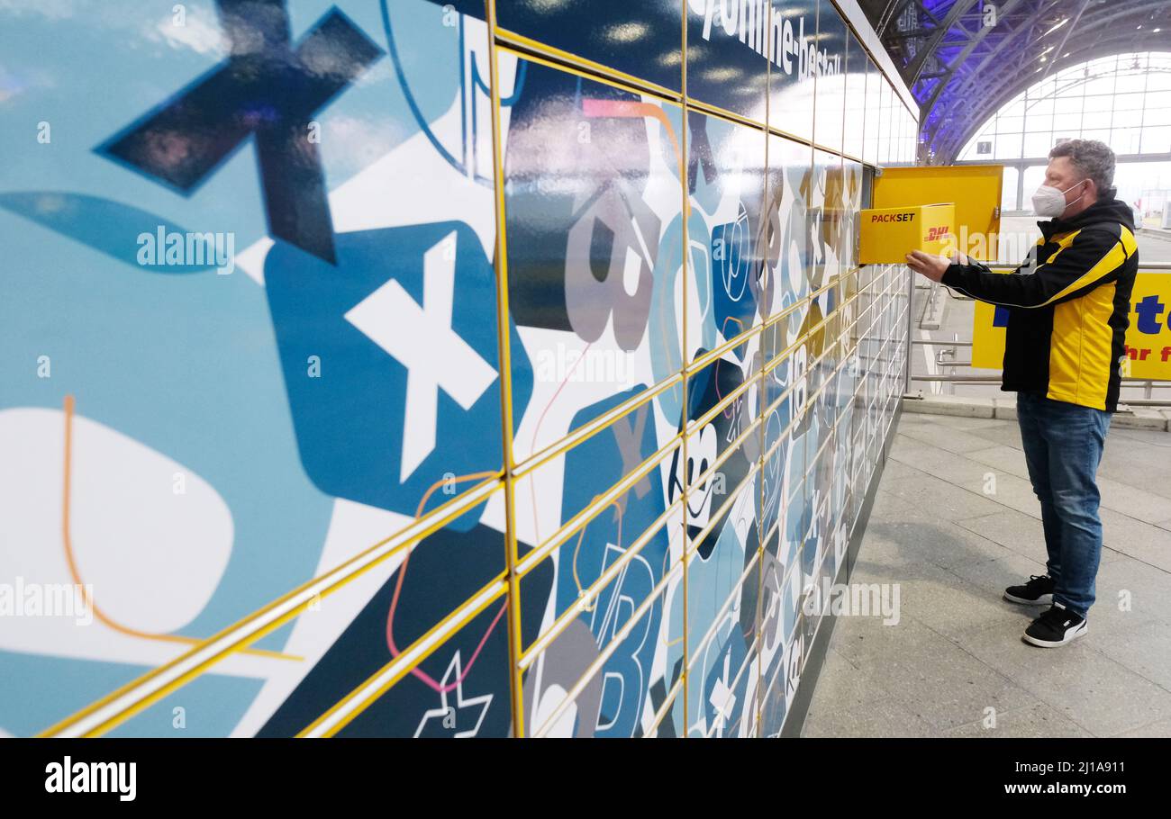 Leipzig, Germany. 24th Mar, 2022. A Deutsche Post employee works on a ...