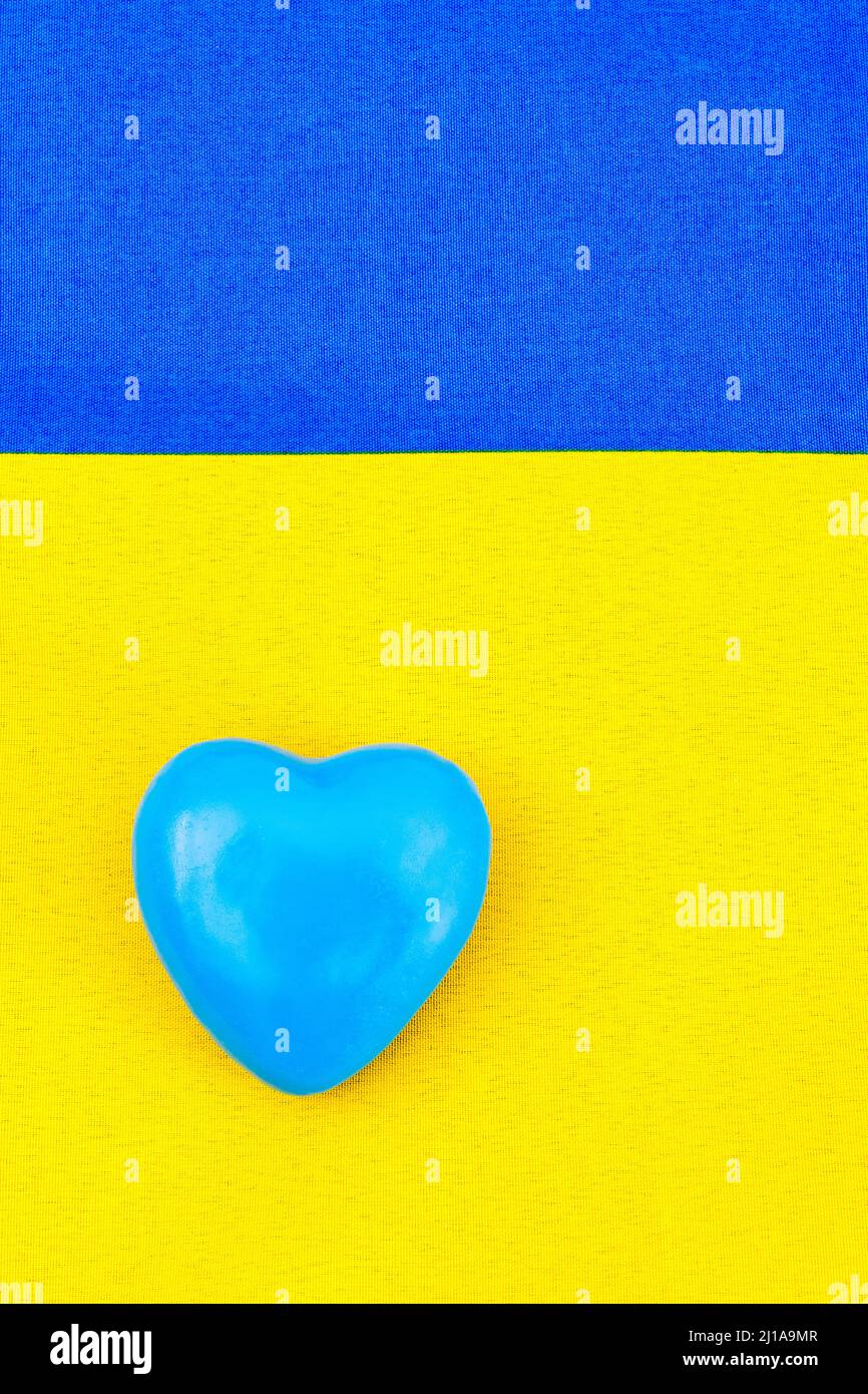 Blue and yellow Ukraine flag with heart shape. For support of Ukraine ...