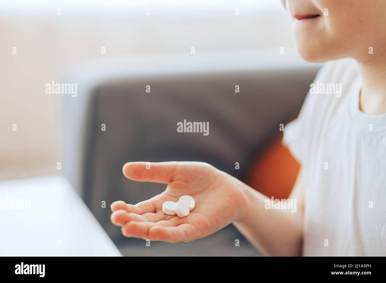 Boy taking vitamins hi-res stock photography and images - Alamy