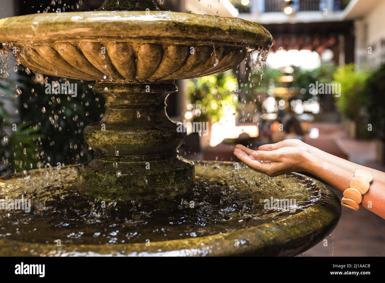 Female hands ancient fountain hi-res stock photography and images - Alamy