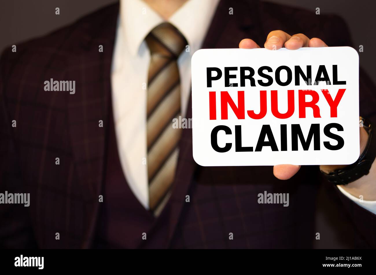 A man holding a Business card Insurance Claim Concept Stock Photo - Alamy