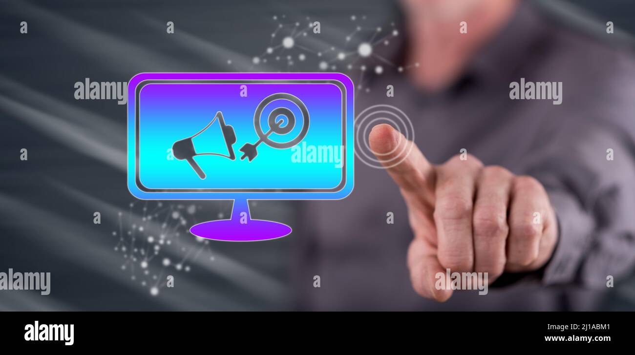 Man touching an ad targeting concept on a touch screen with his finger ...