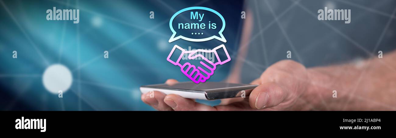 Introduction concept above a smartphone held by a man Stock Photo - Alamy